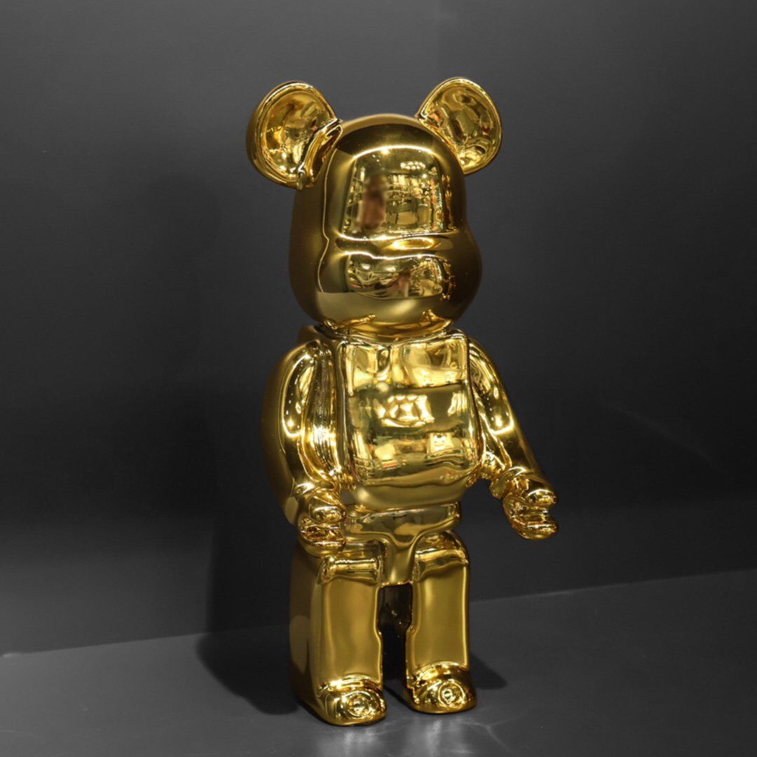 Gold Kaws Bear